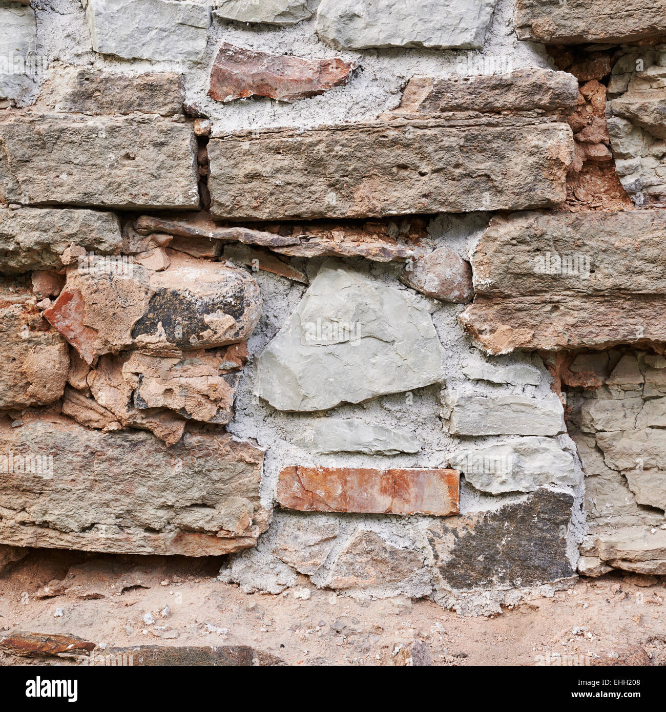 Old stone wall fragment Stock Photo - Alamy