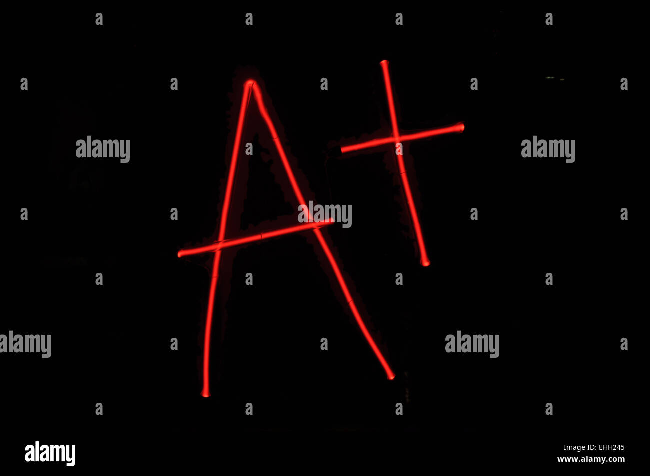 A+ Grade on Neon Red Sign Stock Photo - Alamy