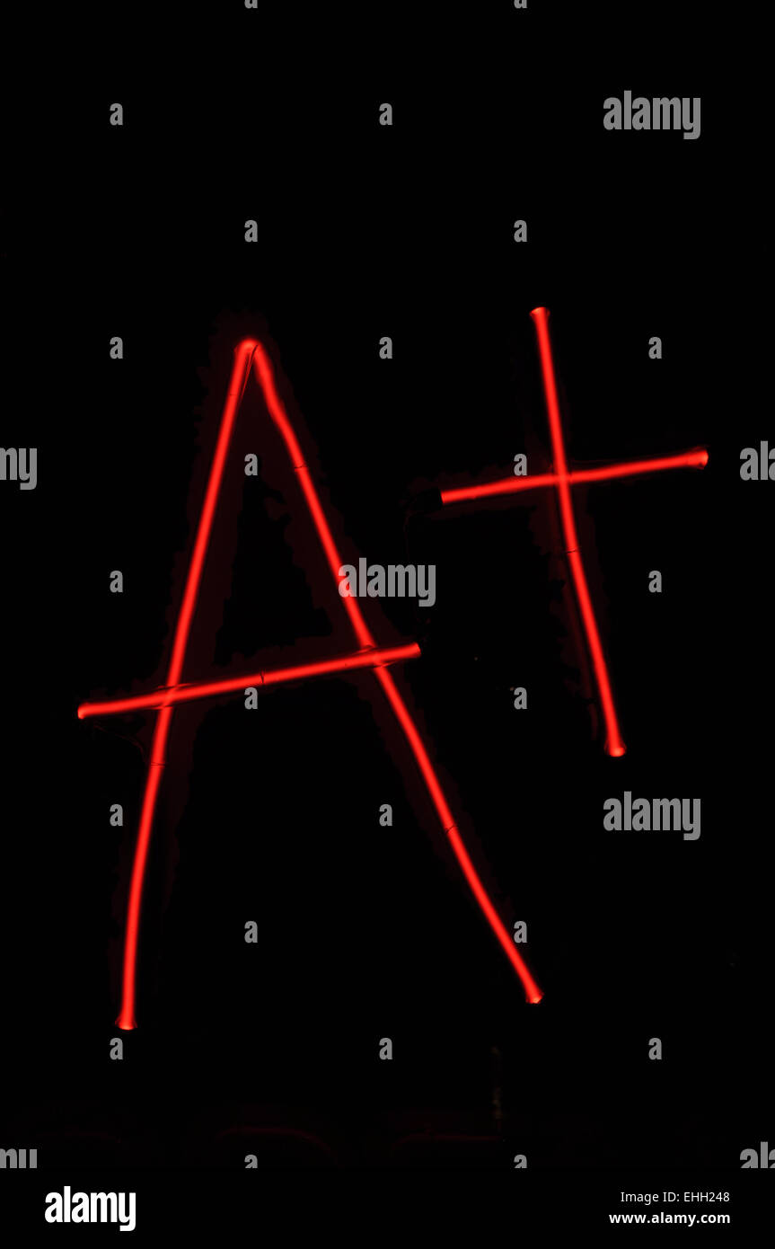 A+ Grade on Neon Red Sign Stock Photo - Alamy