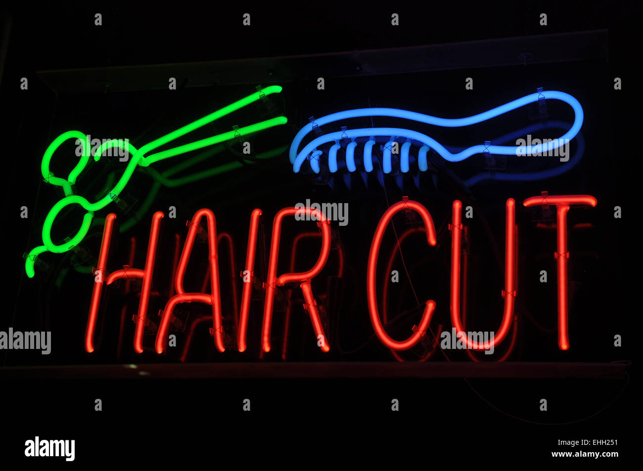 Haircut Neon Sign with Scissors and Comb Stock Photo - Alamy