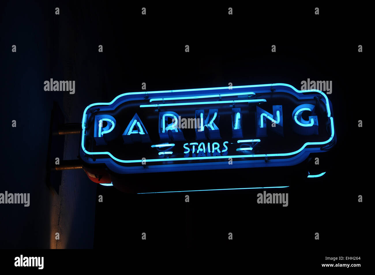 Neon Blue Parking Sign Stock Photo - Alamy