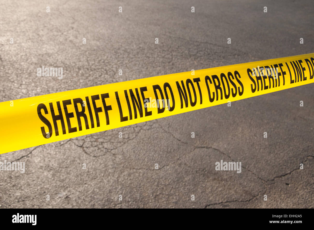 Sheriff line do not cross - caution tape in urban environment Stock ...