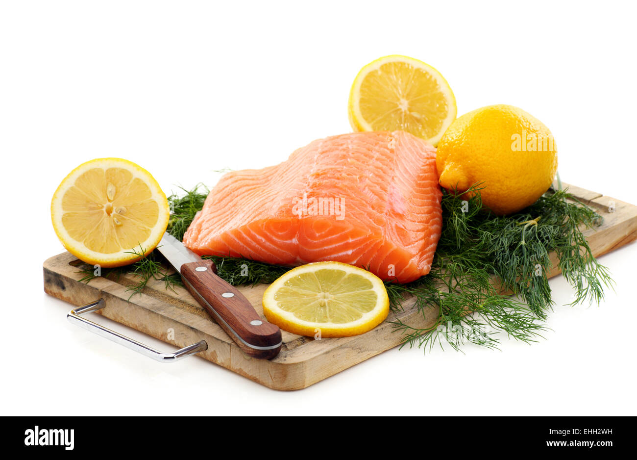 Fresh salmon with herbs and lemon Stock Photo - Alamy