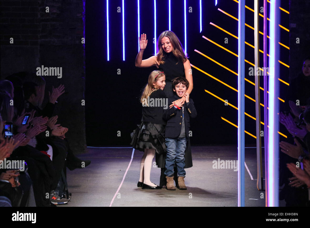 Michelle Smith bows with her children at the Milly By Michelle Smith ...