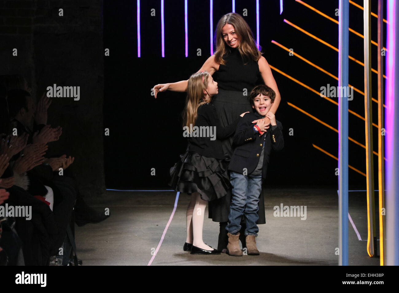 Michelle Smith bows with her children at the Milly By Michelle Smith ...