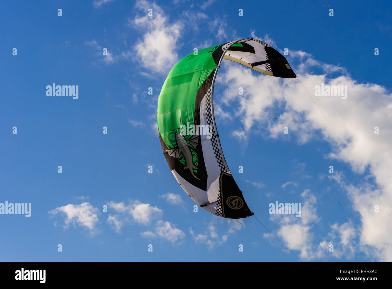 Big kite in the blue sky with some clouds Stock Photo - Alamy