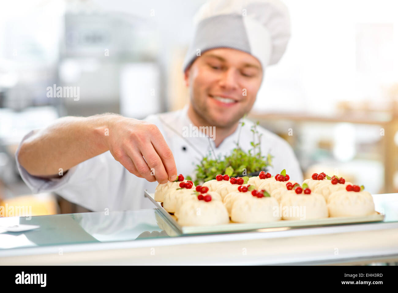 Confectioner with cakes Stock Photo - Alamy