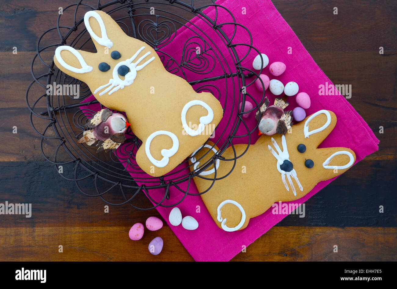 Easter gingerbread bunny cookie on vintage baking rack on dark wood ...