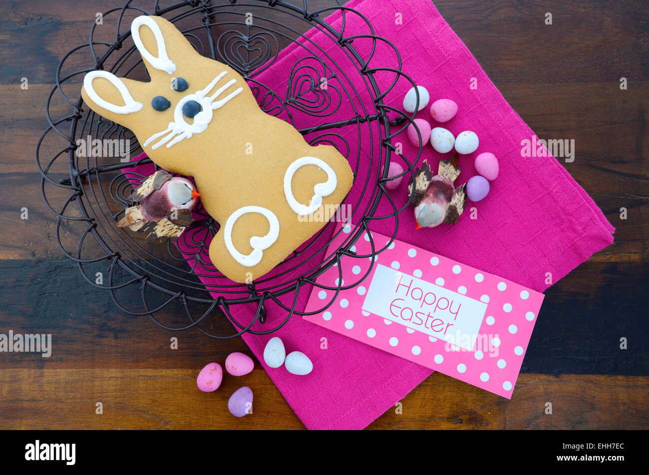 Easter gingerbread bunny cookie on vintage baking rack on dark wood ...