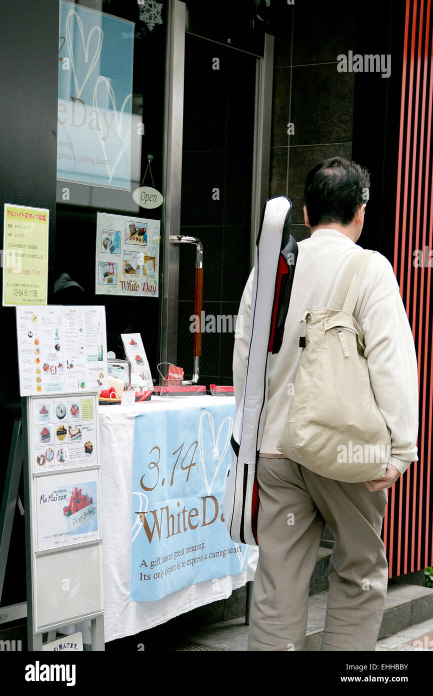 Japan Celebrates White Day on March 14, 2015, Tokyo, Japan : A man ...
