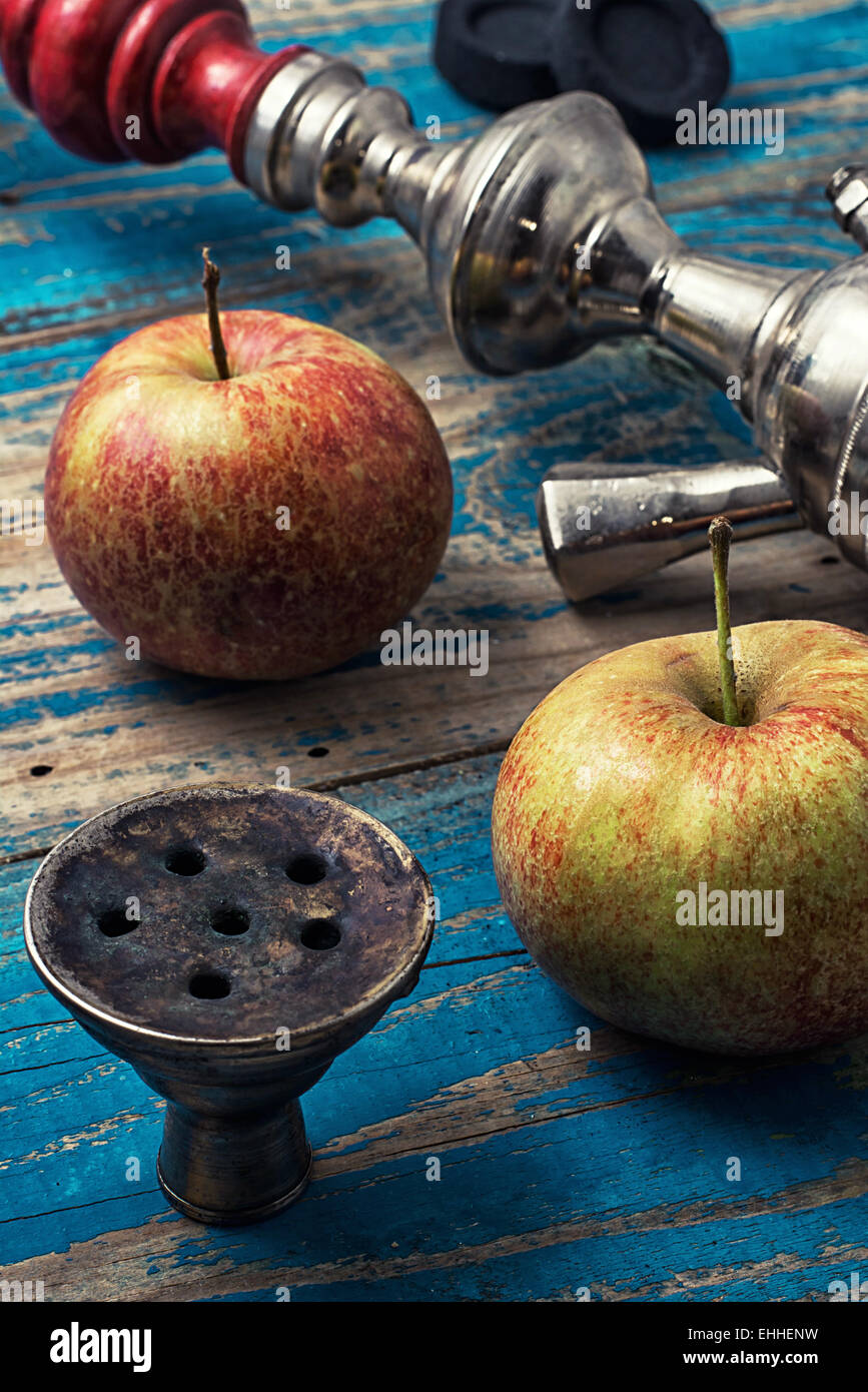 details Shisha and accessories on wooden background.image is tinted in ...