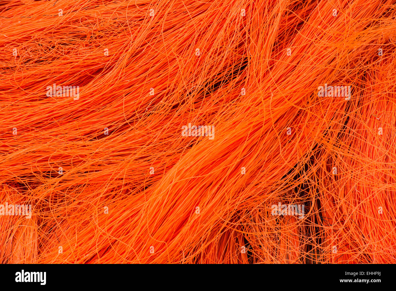 Orange fishing net Stock Photo - Alamy