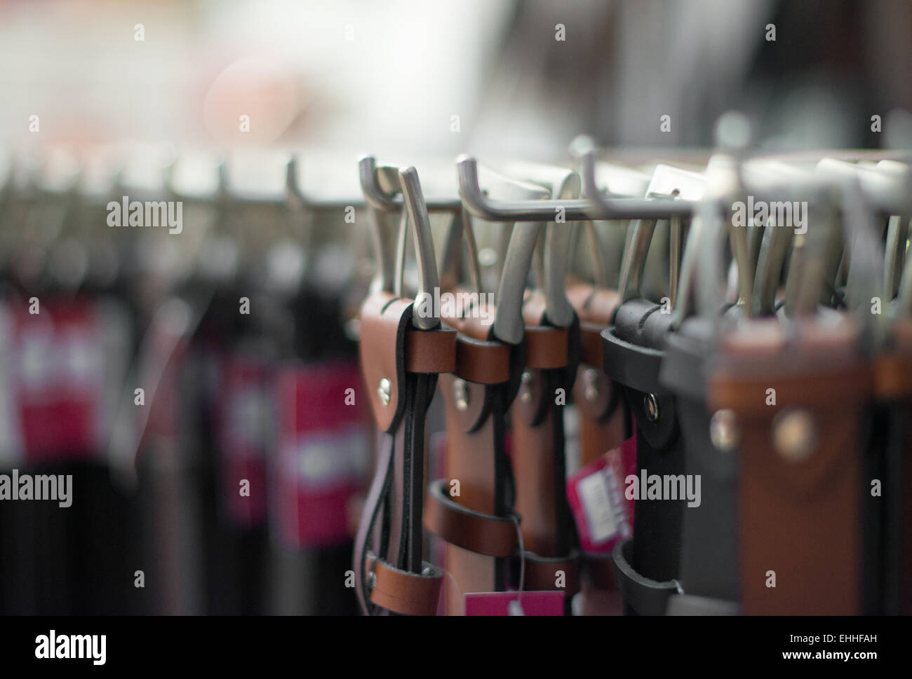 Leather belts collection in the store Stock Photo - Alamy