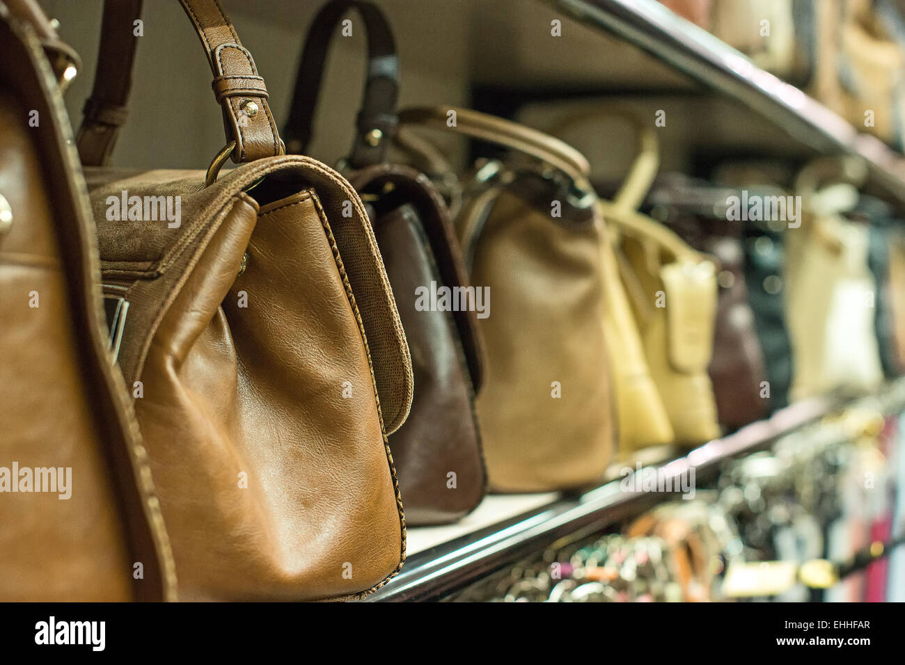 Leather handbags collection in the store Stock Photo - Alamy