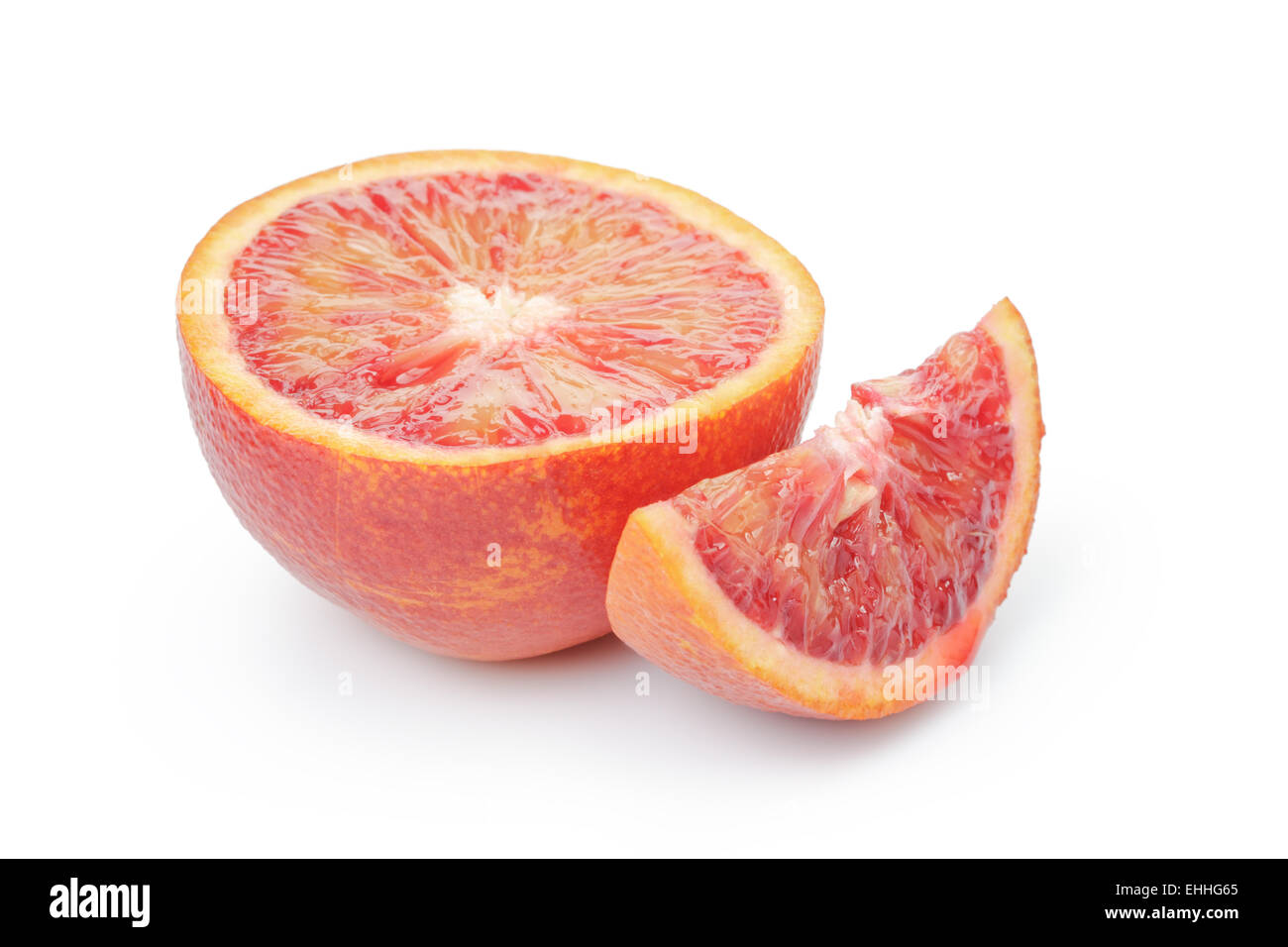 half of ripe blood red orange and segment isolated Stock Photo - Alamy