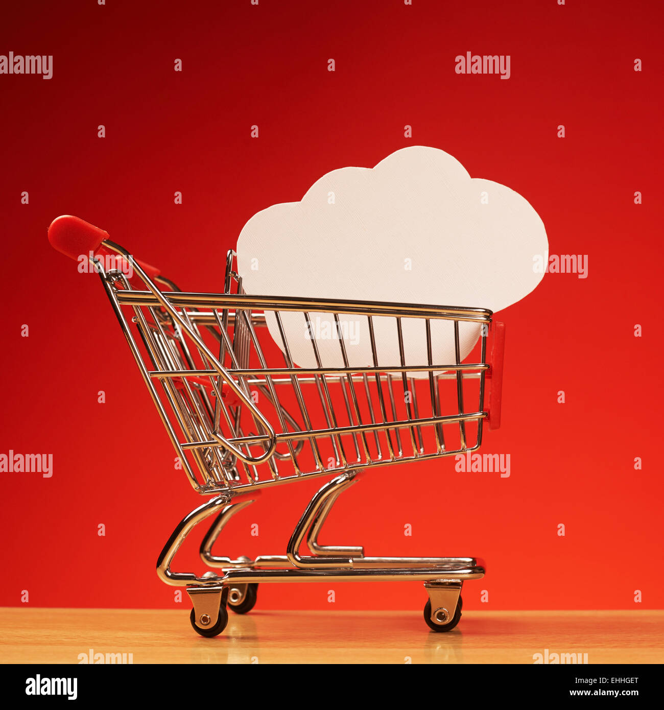 Cloud shape inside shopping cart Stock Photo - Alamy