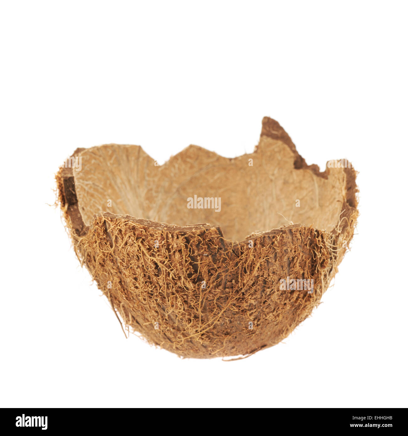 Coconut fruit shell cut in half Stock Photo - Alamy