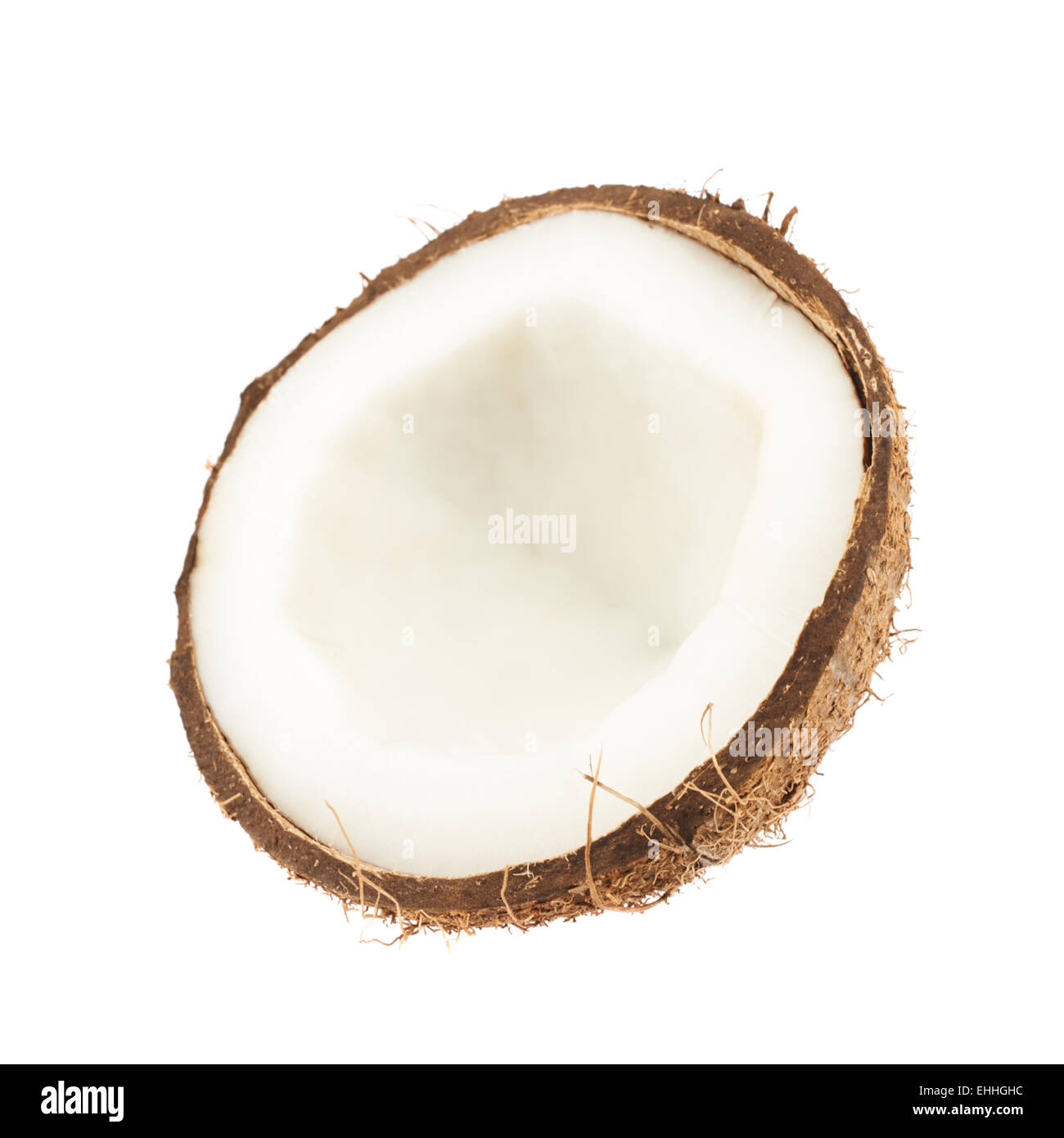 Coconut fruit cut in half Stock Photo - Alamy