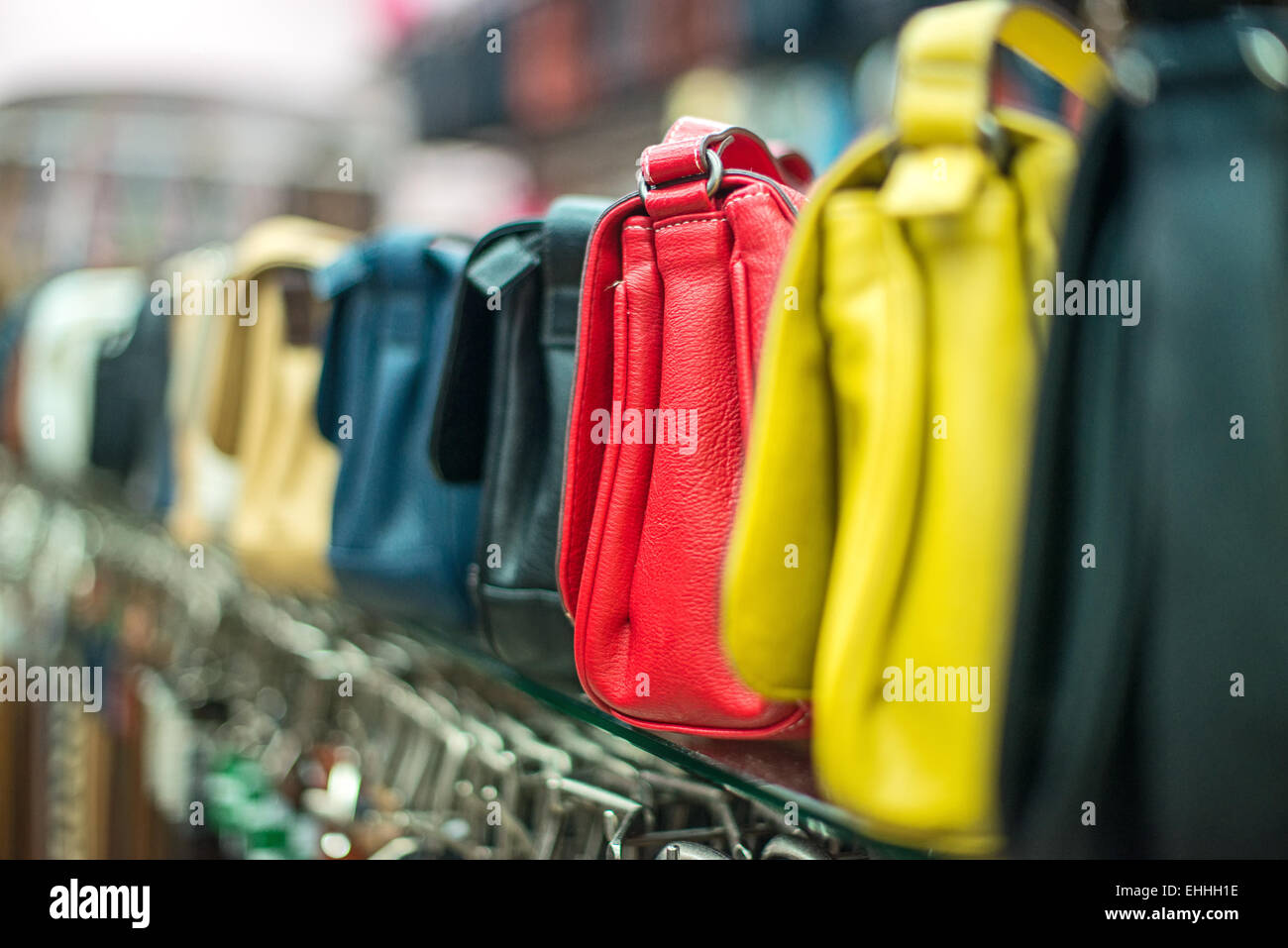 Leather handbags collection in the store Stock Photo - Alamy