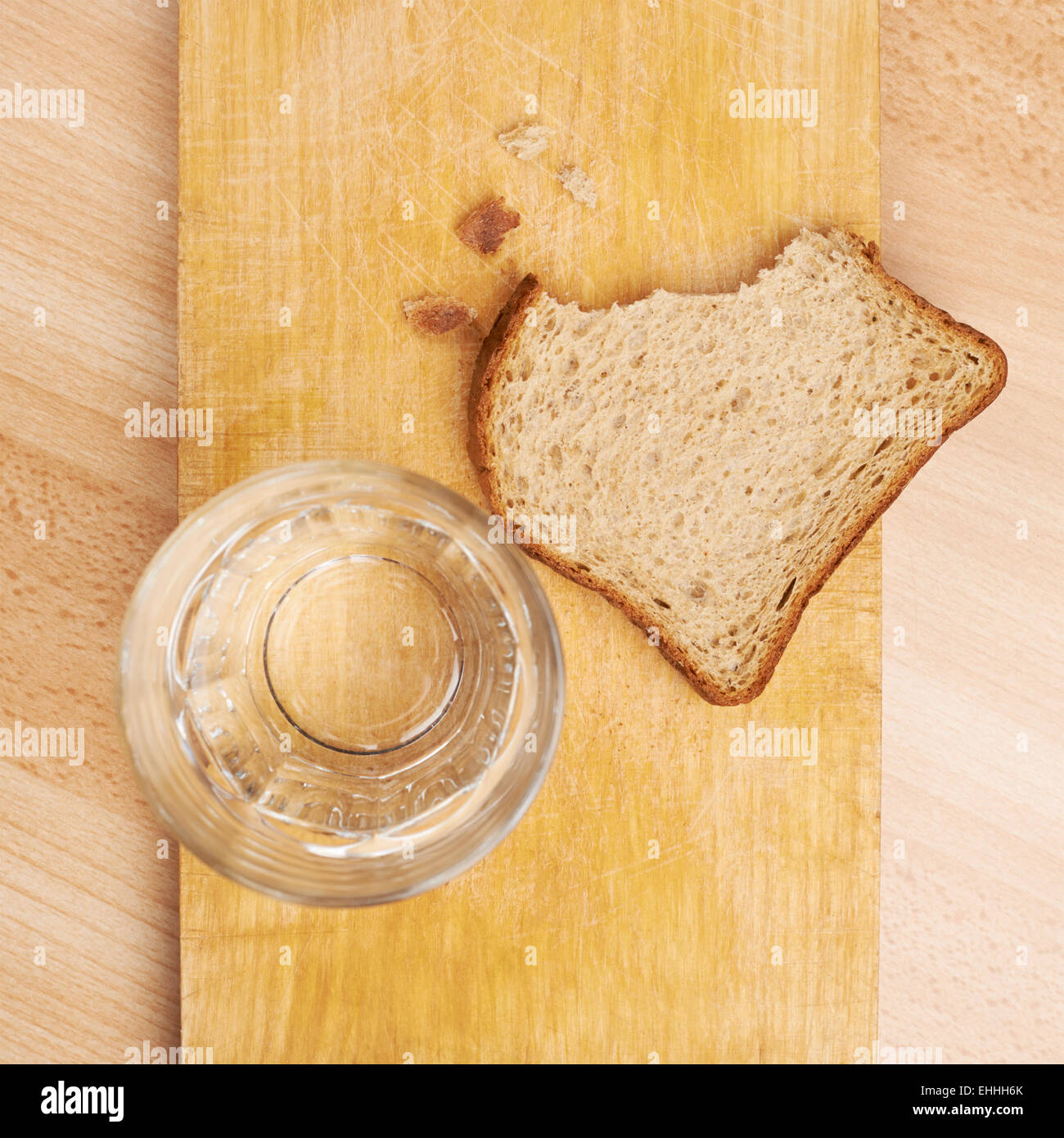 Glass of water and bread Stock Photo - Alamy