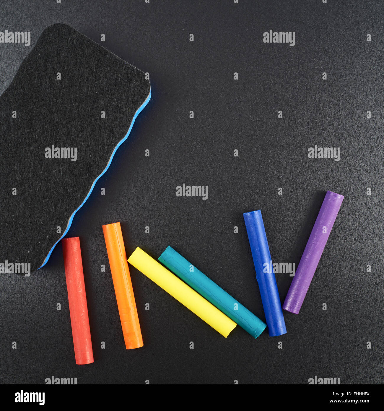Black board with a multiple chalks Stock Photo - Alamy