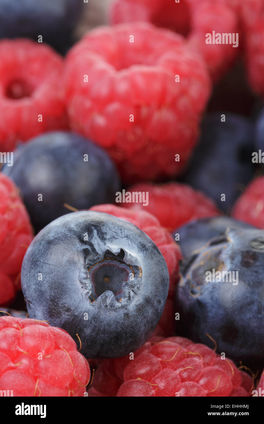 close up photo of ripe blueberry and raspberry Stock Photo - Alamy