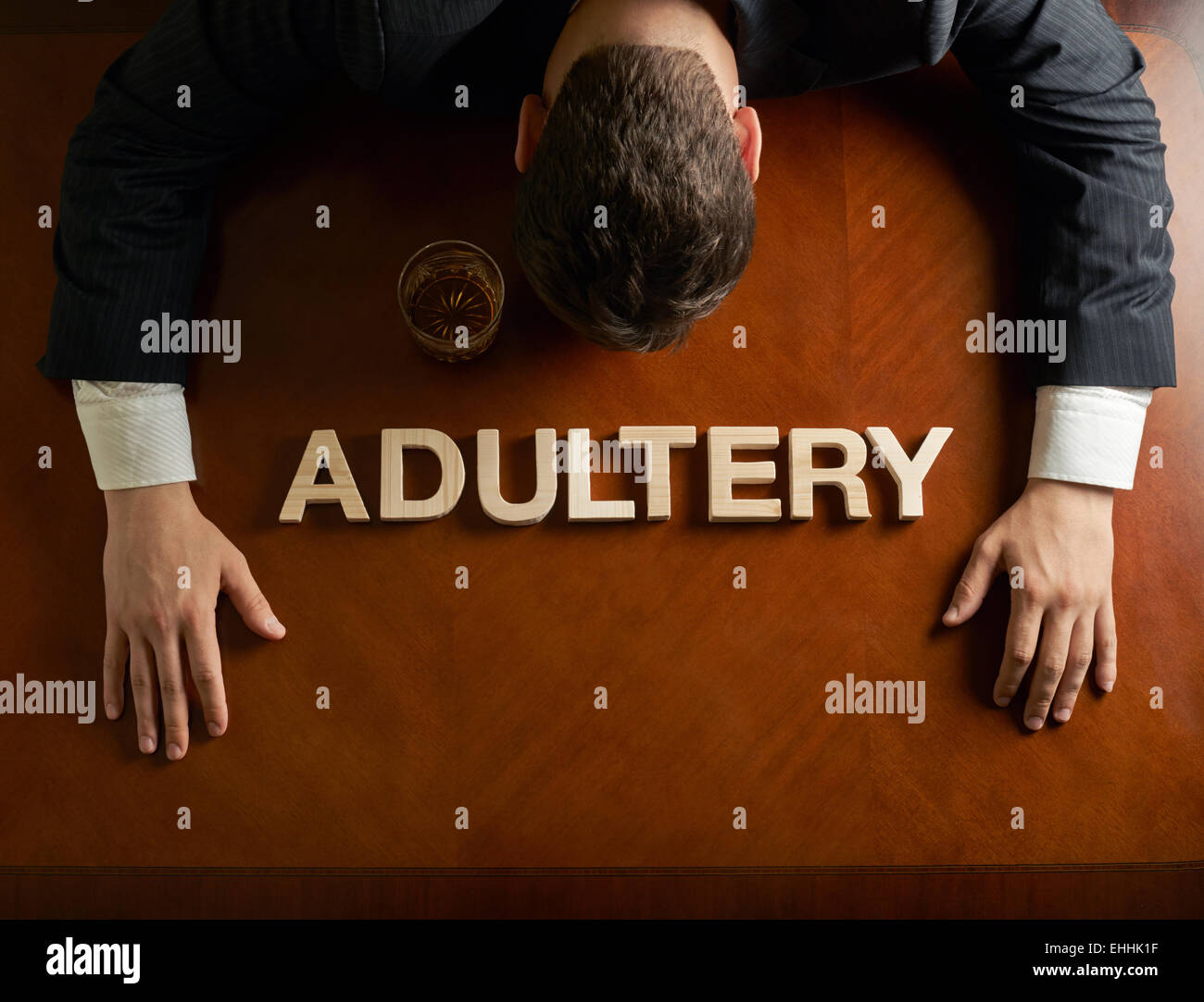 Word Adultery and devastated man composition Stock Photo - Alamy