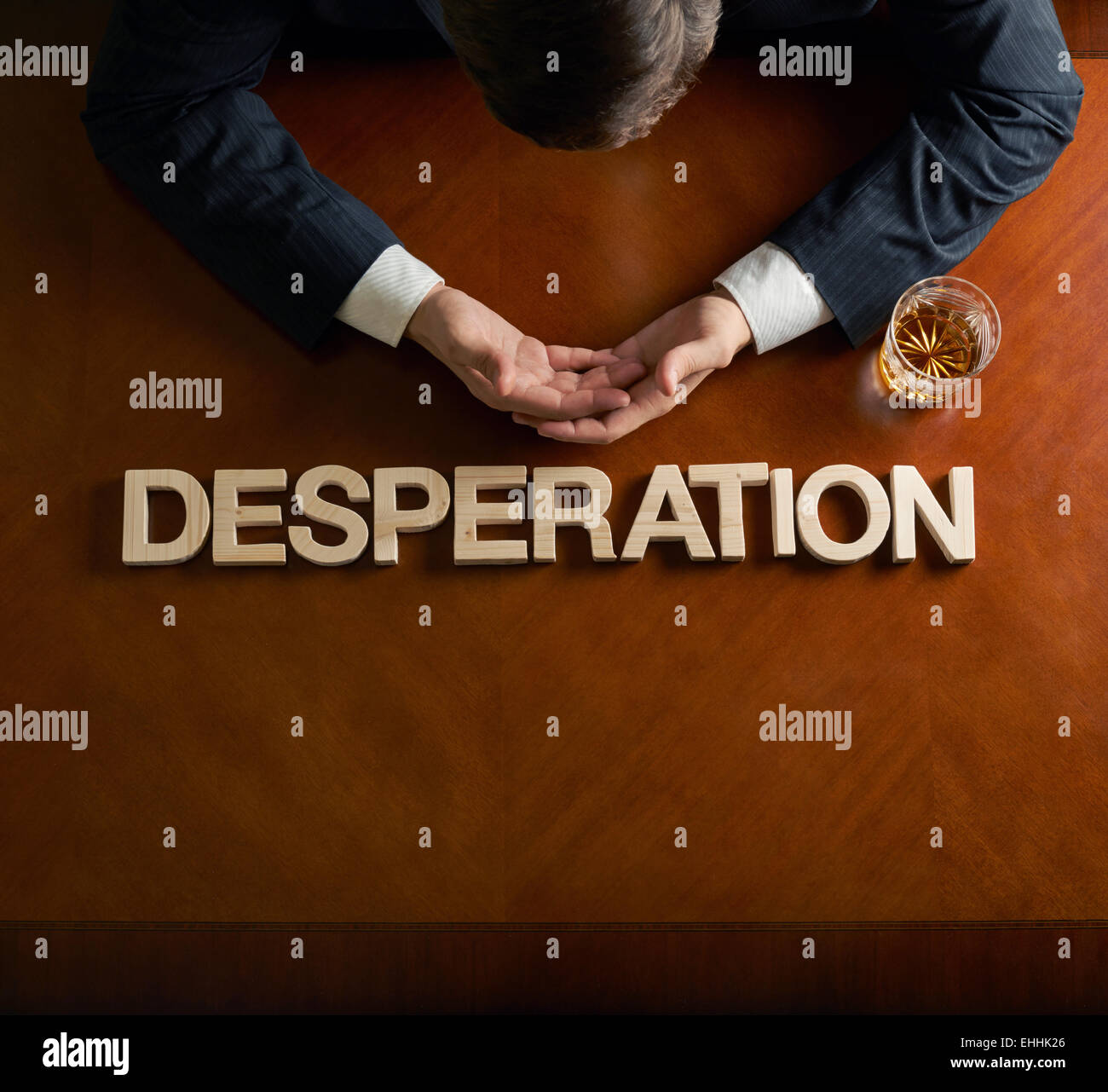 Word Desperation and devastated man composition Stock Photo - Alamy