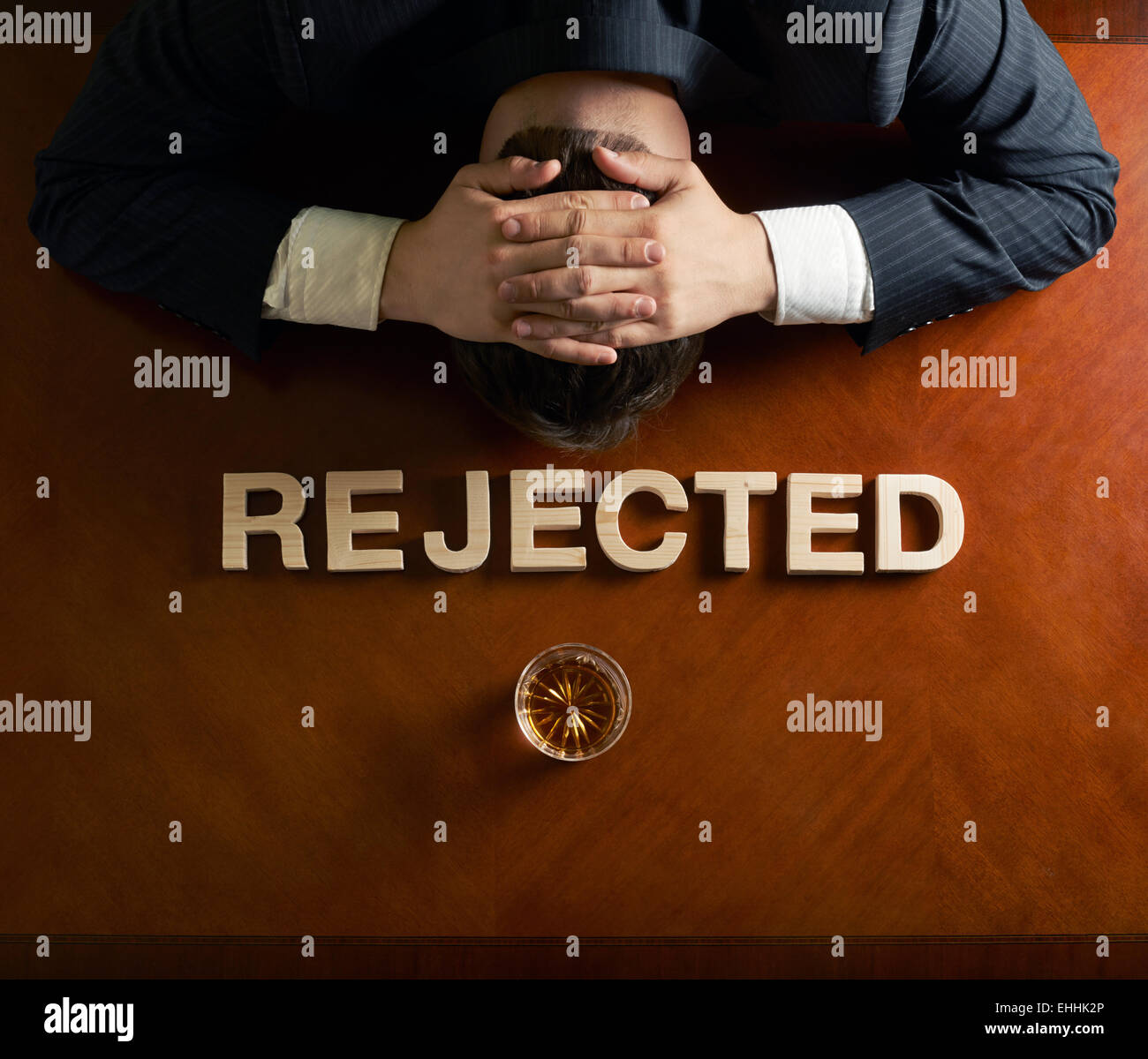 Word Rejected and devastated man composition Stock Photo - Alamy