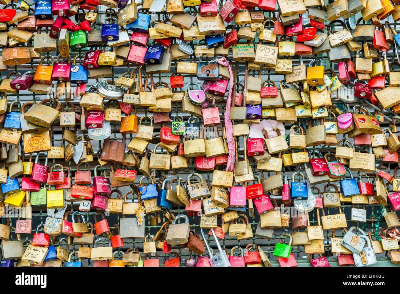 Many padlocks in different colors on a fence in Cologne, Germany Stock ...