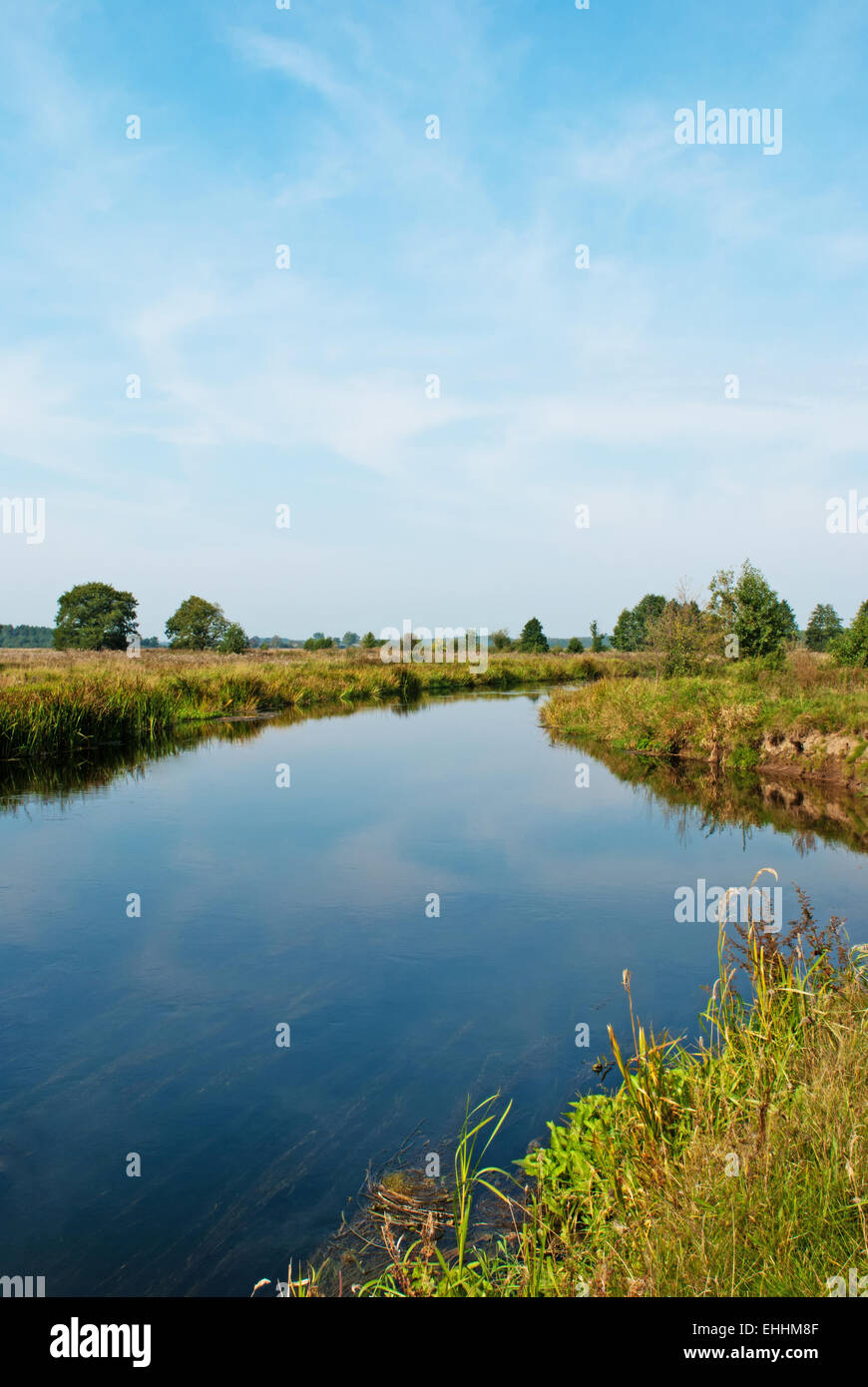 Landscape with river and autumn forest Stock Photo - Alamy