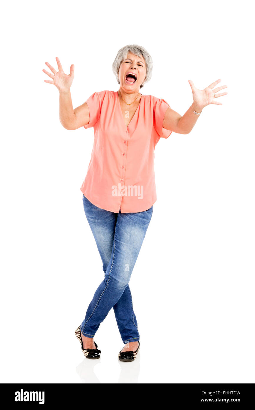 Portrait of a elderly woman yelling and worried with something ...