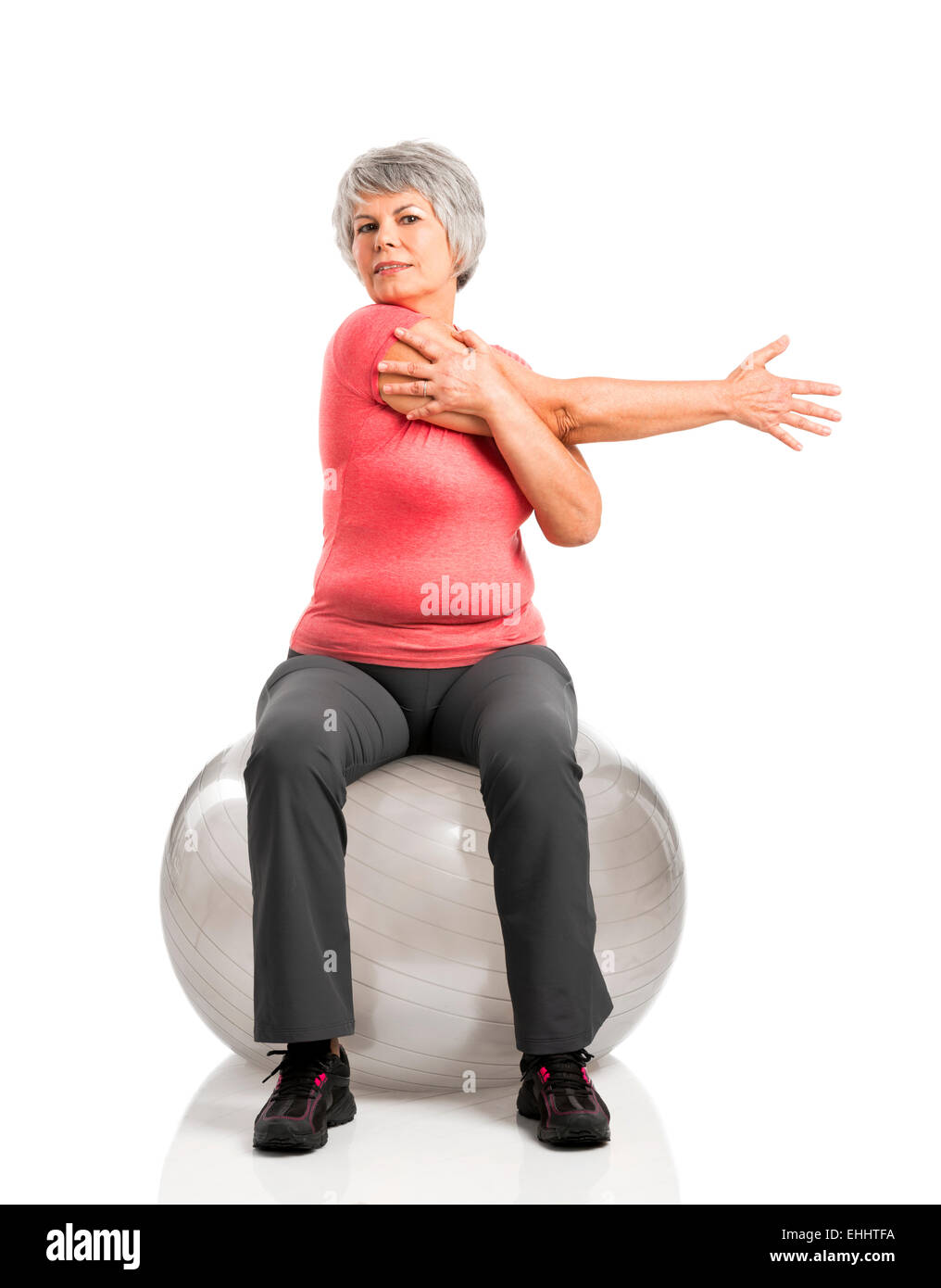 Happy fitness old woman making exercises with a PIlates ball Stock ...