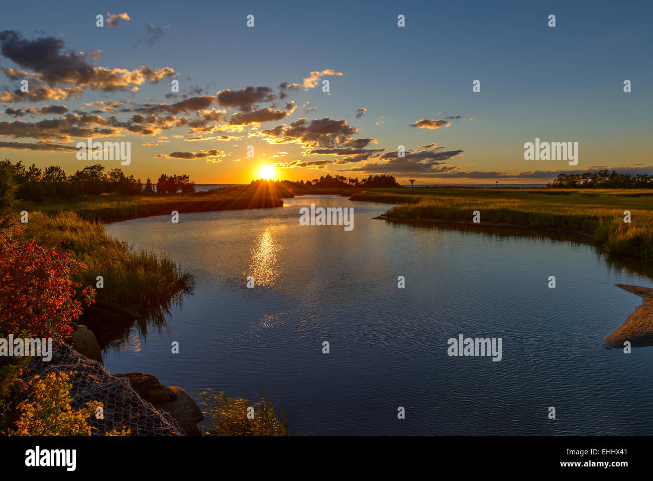 Evening landscape with sunset over river Stock Photo - Alamy