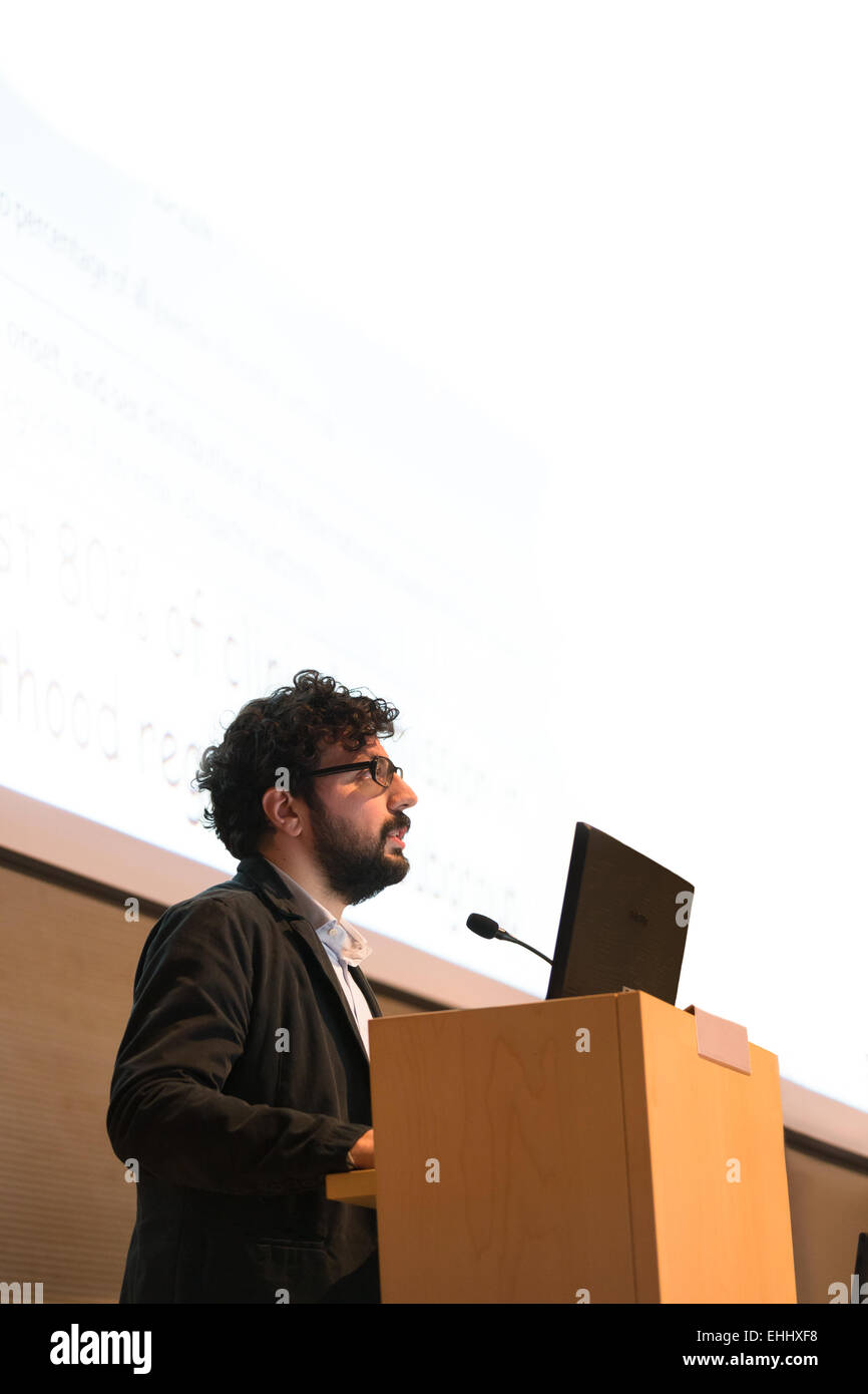 Speaker giving talk on podium at Business Conference Stock Photo - Alamy