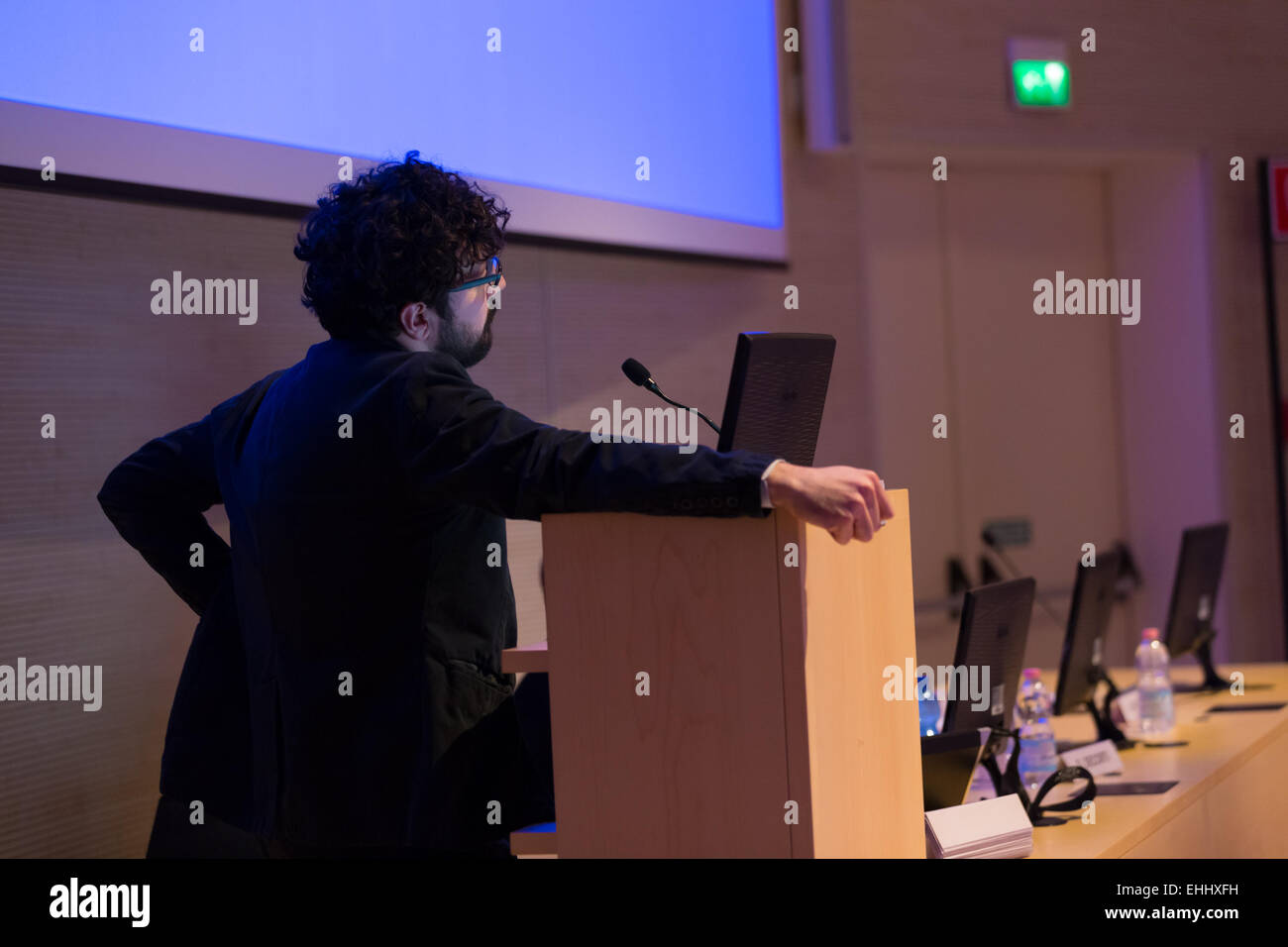 Speaker giving talk on podium at Business Conference Stock Photo - Alamy