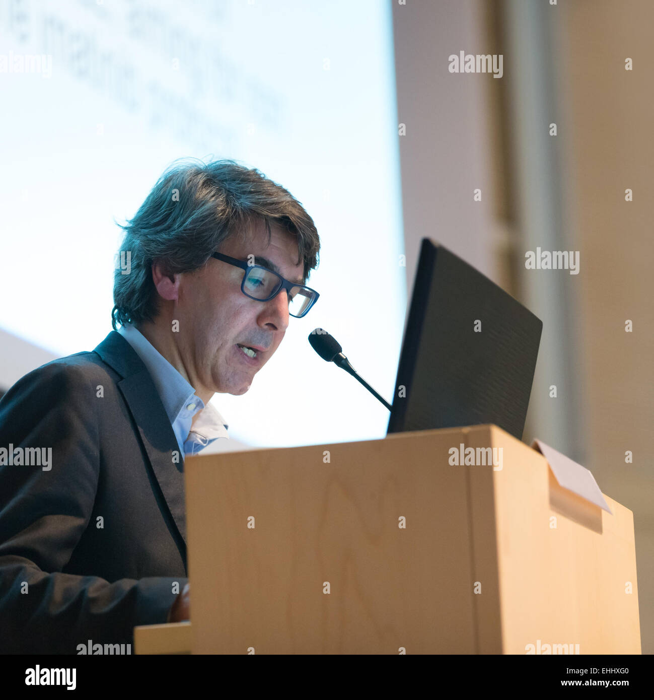 Speaker giving talk on podium at Business Conference Stock Photo - Alamy