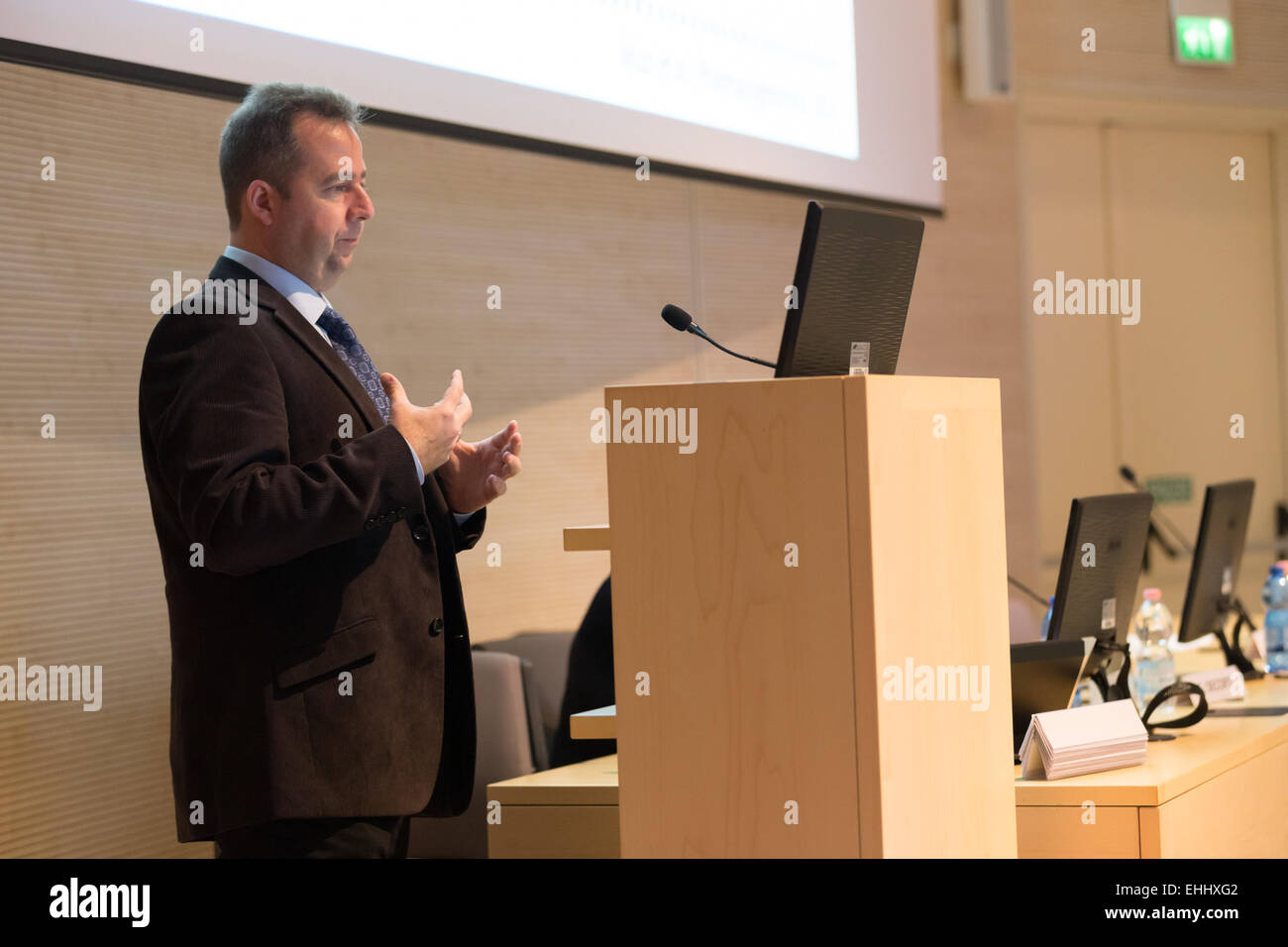 Man giving speech on podium hi-res stock photography and images - Alamy