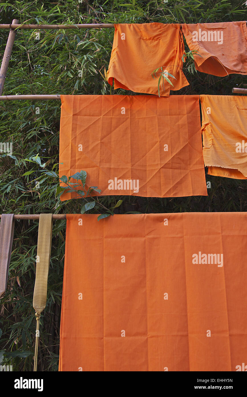 Monk washing clothes hi-res stock photography and images - Alamy