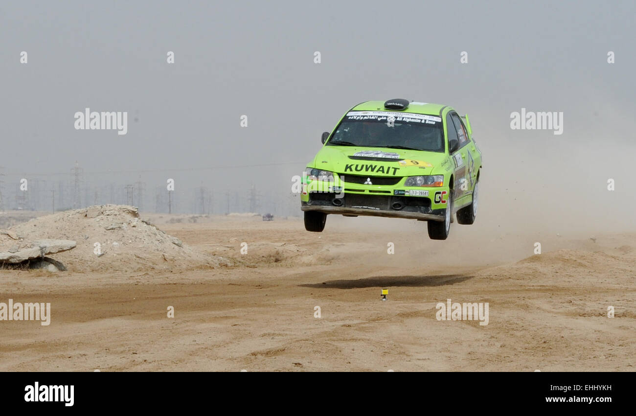 Kuwait City, Kuwait. 14th Mar, 2015. Kuwaiti driver Salah Bin Eidan and ...