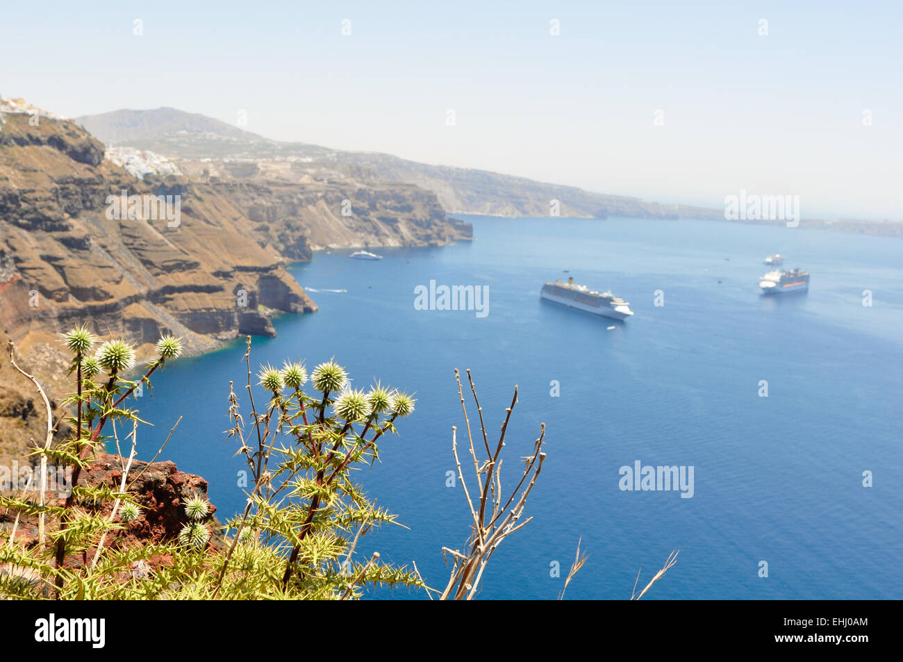 Santorini cliff coast with blue ocean of Aegean Sea, Greece Stock Photo ...
