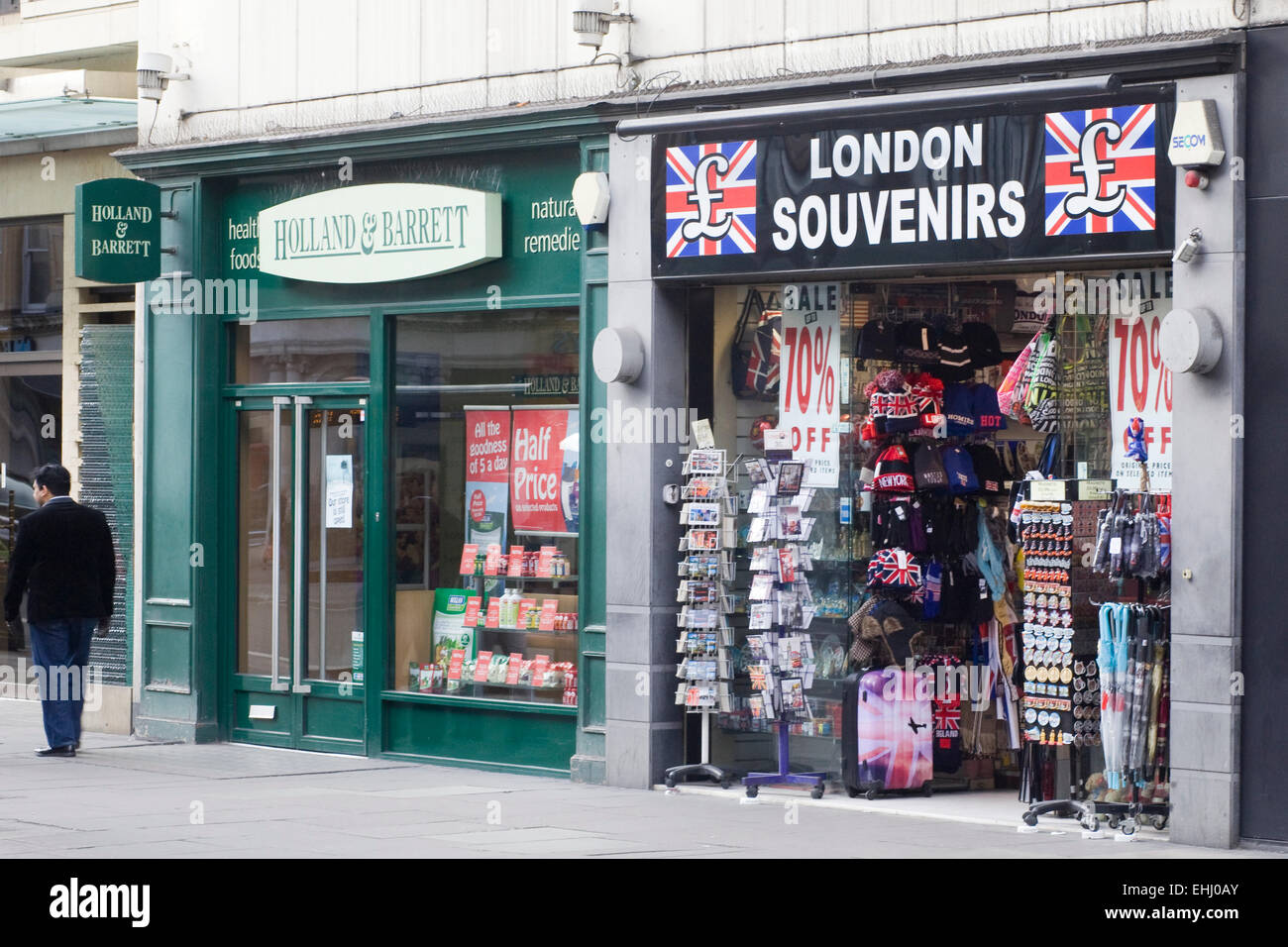 London Souvenirs and Holland and Barrett Shop in London England Stock ...