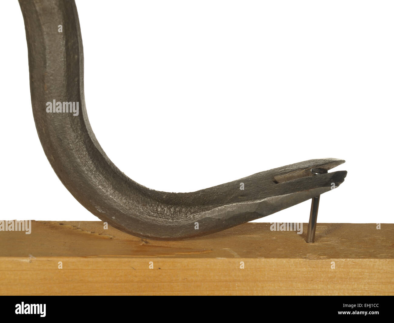 Steel nail puller to pull out a nail isolated on white background Stock ...