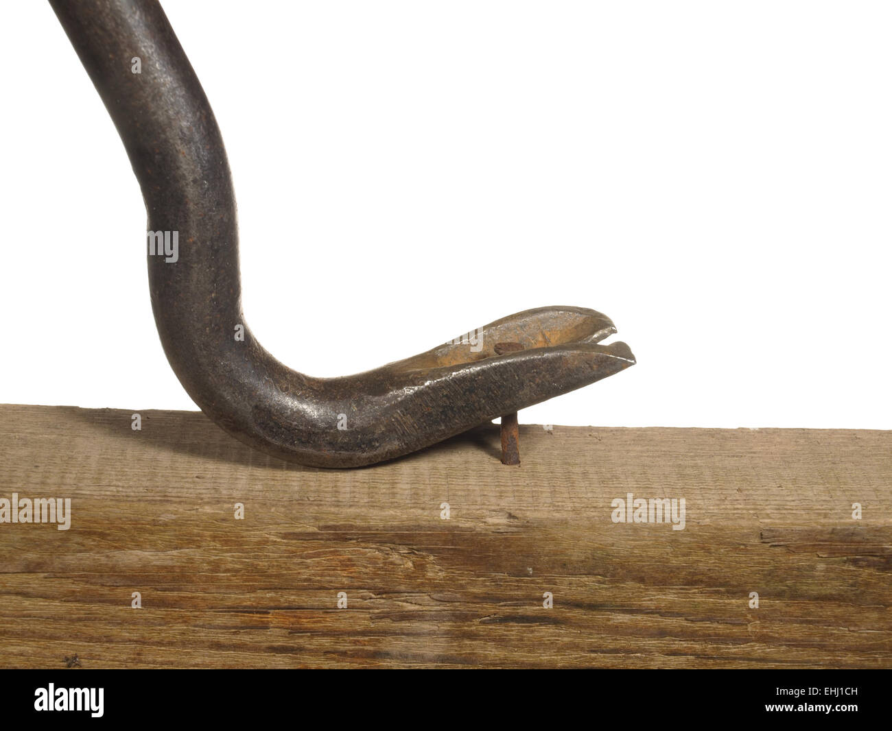Steel nail puller to pull out a nail isolated on white background Stock ...