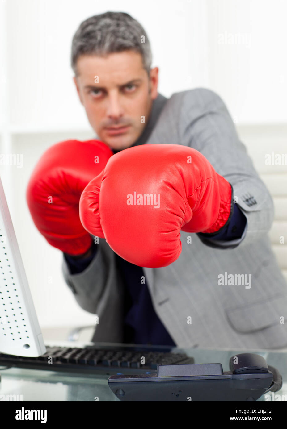 Businessman beating the competition Stock Photo - Alamy Businessman beating the competition Stock Photo - Alamy