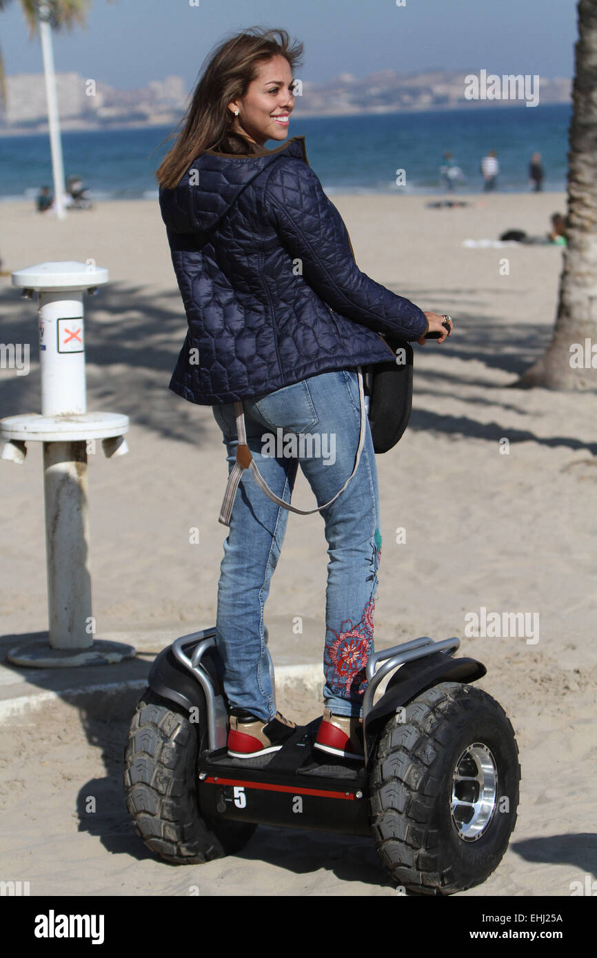 Woman on personal Transporter Segway type electric vehicle on Beach ...