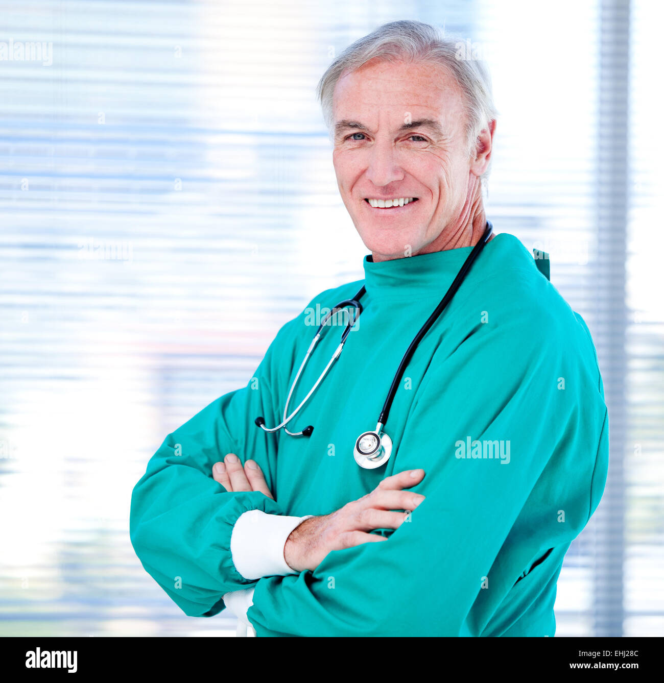 Portrait of a positive senior surgeon Stock Photo - Alamy