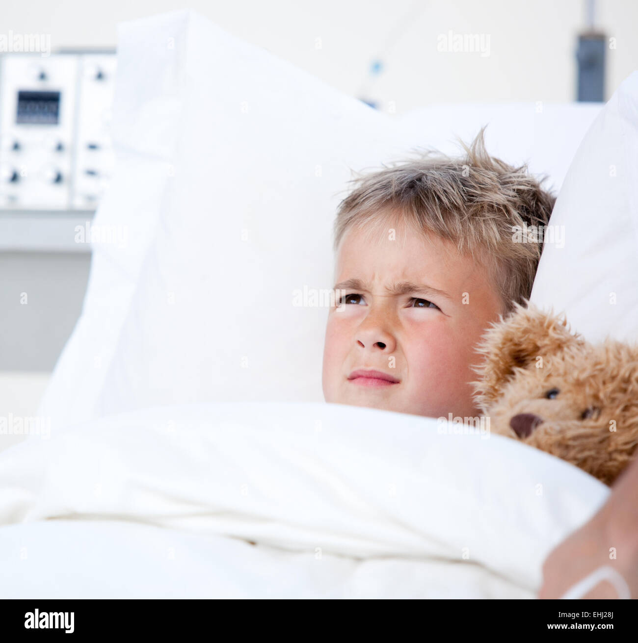 Boy lying in hospital bed hi-res stock photography and images - Alamy