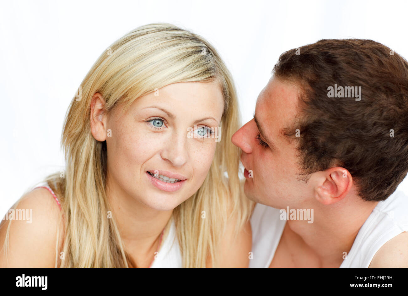 Man telling a woman something important Stock Photo - Alamy