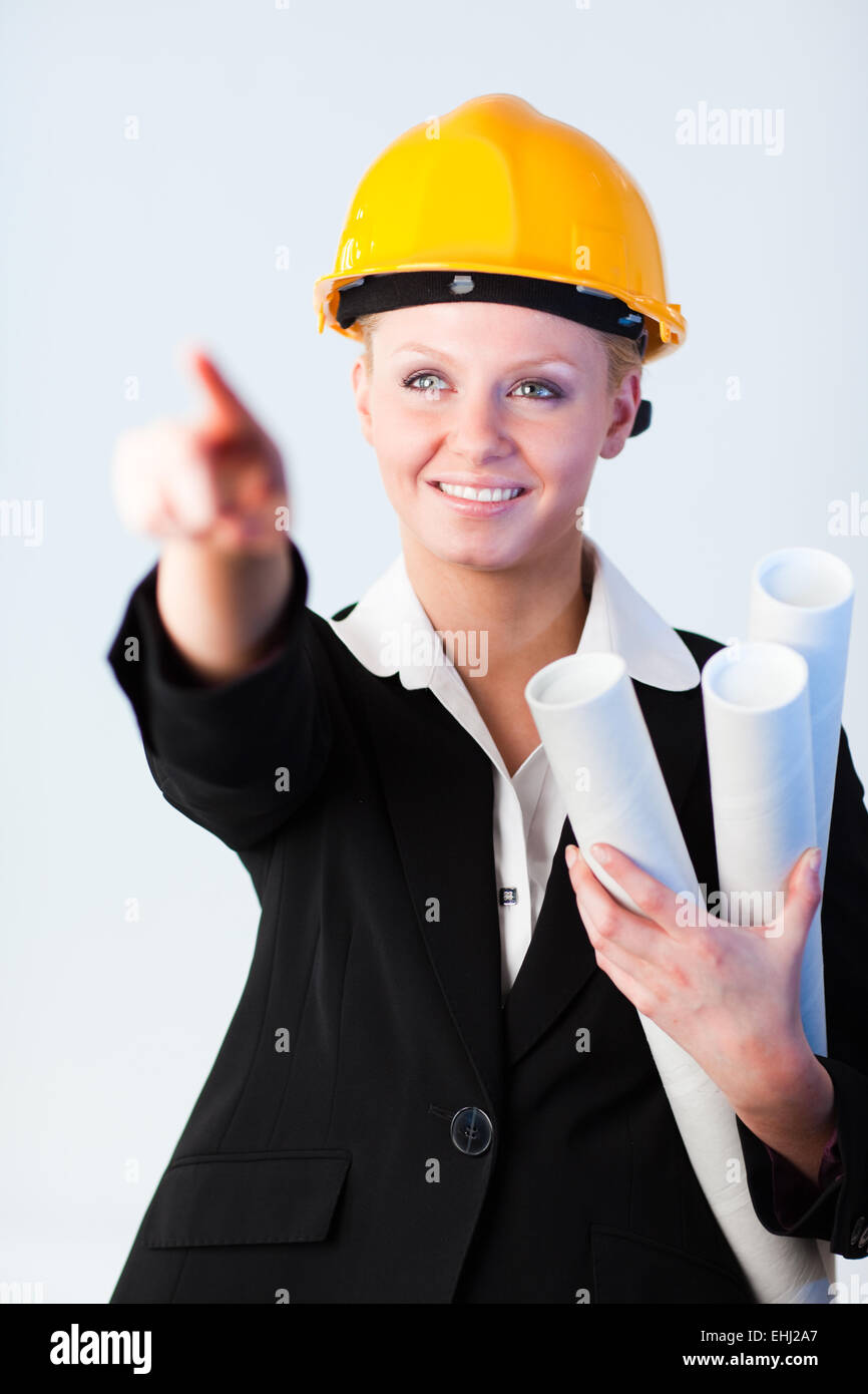 Female Construction worker pointing Stock Photo - Alamy